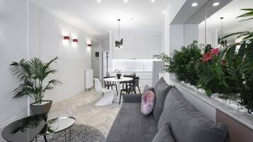 Apartamento Superior, varanda, Vista para a cidade | Sala de estar | Smart TV, Netflix