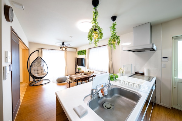 Vila, 4 quartos | Cozinha privada | Geladeira, micro-ondas, cooktop, chaleira elétrica