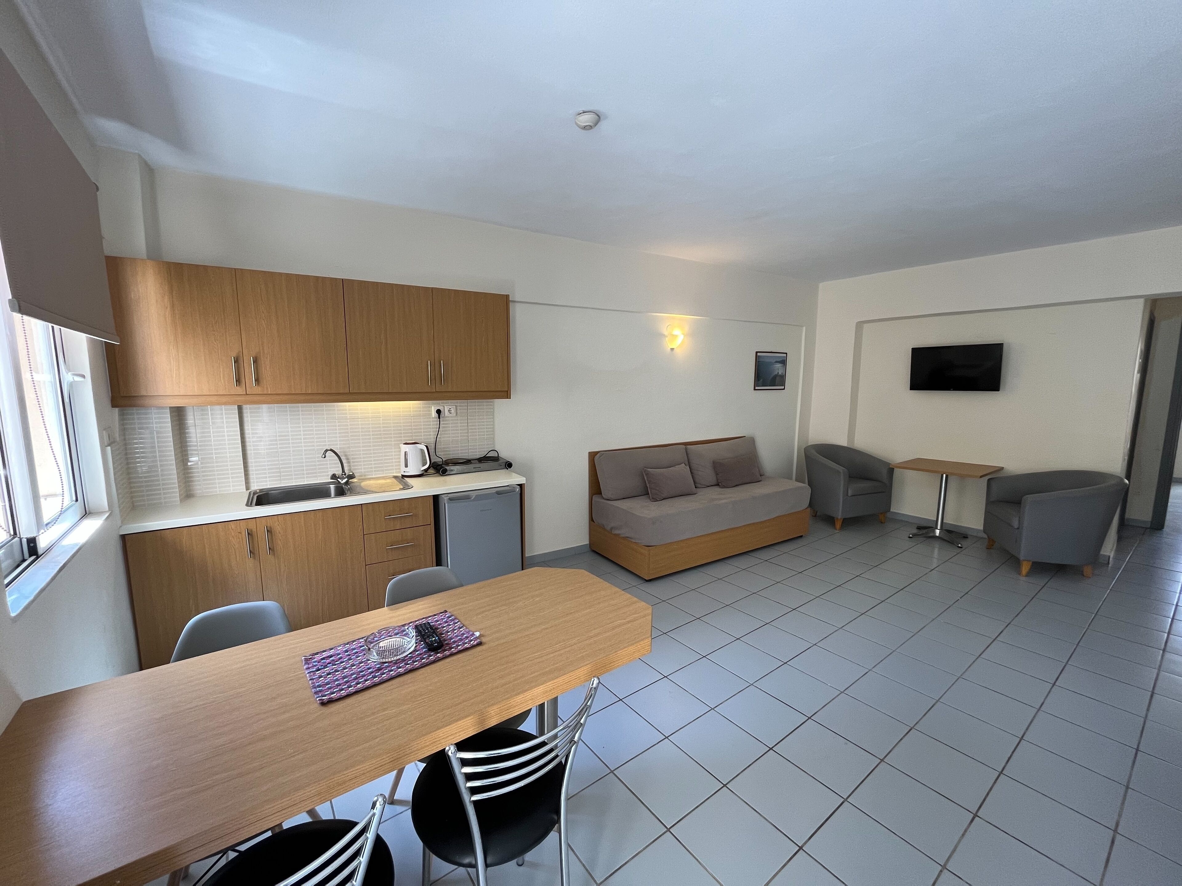 Apartamento (4 Adults) | Cozinha privada | Geladeira, cooktop, chaleira elétrica, torradeira