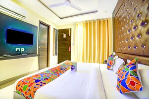 Quartos à prova de som, Wi-Fi de cortesia, roupa de cama