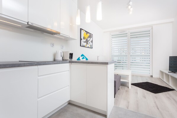 Apartamento conforto | Cozinha privada | Geladeira grande, fogão, cooktop, lava-louças