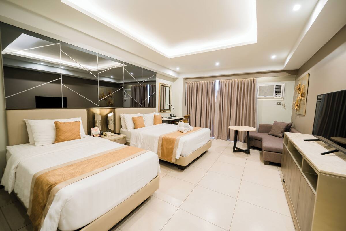 Quarto Twin Premium | Roupa de alta qualidade, edredões de penas, minibar, cofre no quarto