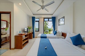 Quarto triplo luxo, vista para o rio | Frigobar, escrivaninha, cortinas blackout, ferros/tábuas de passar roupa