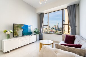 Apartamento grand, 2 quartos | Área de estar