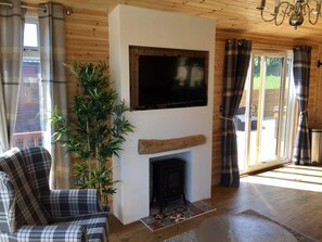 Casa de Campo, 2 quartos | Sala de estar | TV plasma, lareira 