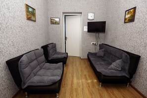 Apartamento | Área de estar | TV de tela plana