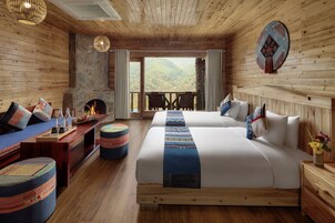 Quarto premium, sacada, vista para a montanha | Roupas de cama premium, frigobar, individualmente decorados