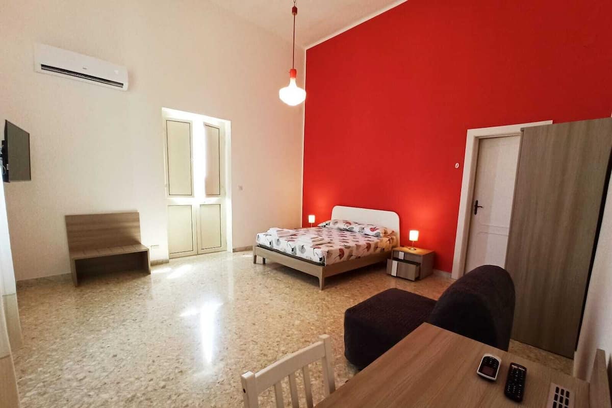 Apartamento Familiar, 1 quarto | 2 quartos, cofre no quarto, secretária, ferro/tábua de engomar