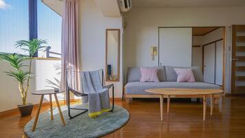 Apartamento | Sala de estar | Televisor, filmes pagos