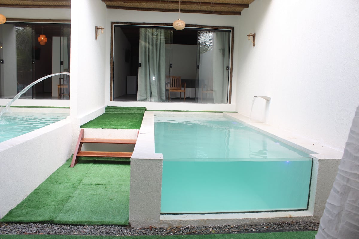 Suíte Charme com piscina privativa | 1 quarto, frigobar, Wi-Fi de cortesia, roupa de cama