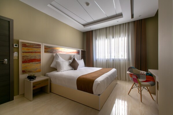 Quarto Deluxe | Cofre no quarto, secretária, quartos insonorizados 