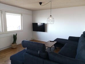 Apartamento panorâmico | Área de estar | Smart TV, serviços de streaming