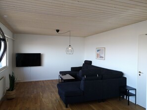 Apartamento panorâmico | Área de estar | Smart TV, serviços de streaming