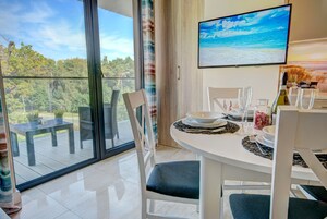 Apartamento premium, 1 quarto (301) | Área de estar | Pisos aquecidos