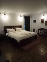 Quarto tradicional | Área de estar | TV