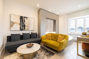 Estúdio design, banheiro privativo | 1 quarto, roupas de cama premium, cortinas blackout