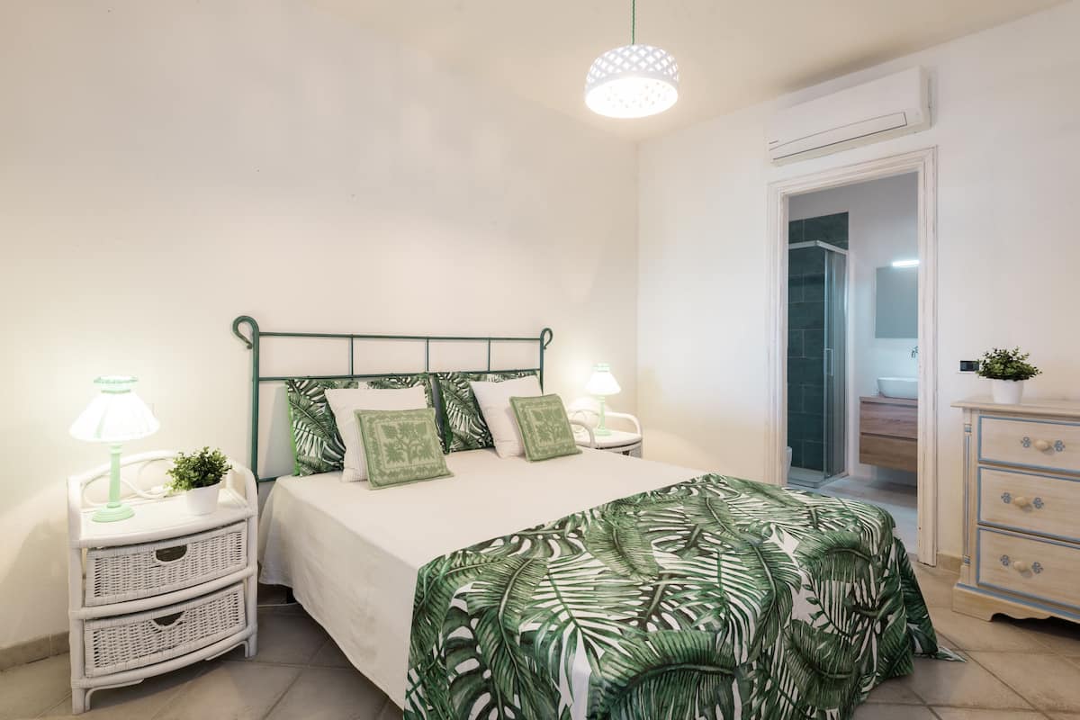 Apartamento, 2 quartos (S'Abba e Sa Pedra Su) | 2 quartos, ferros/tábuas de passar roupa, Wi-Fi de cortesia