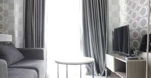 Quarto | Sala de estar | TV