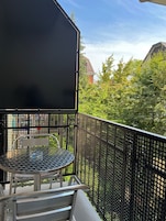 Apartamento superior | Vista para o jardim