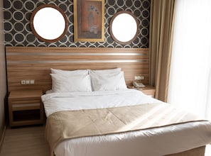 Quarto standard | Frigobar, cofres nos quartos, escrivaninha, quartos à prova de som
