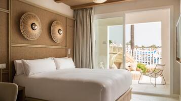 Suite, varanda | Roupa de alta qualidade, minibar, cofre no quarto, secretária