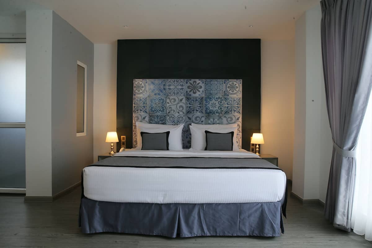 Quarto Deluxe, vista para a piscina | 1 quarto, lençóis italianos Frette, roupa de alta qualidade
