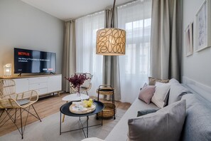 Apartamento luxo | Área de estar | Smart TV, Netflix, brinquedos, filmes recentes