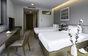 Quarto duplo luxo, 2 camas de solteiro, vista para o jardim | Frigobar, cofres nos quartos, quartos à prova de som
