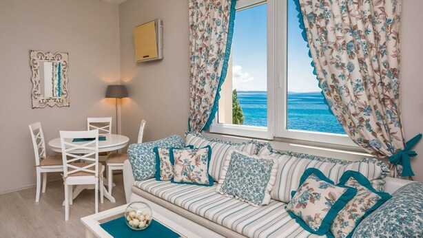 Apartamento panorâmico, 1 quarto, vista para o mar | Sala de estar