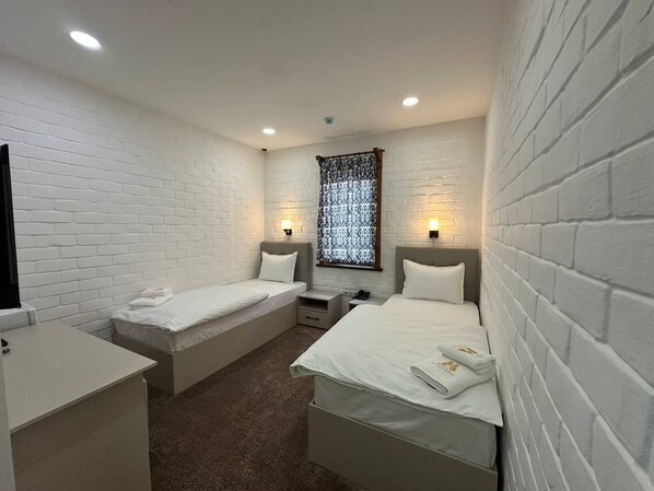 Quarto Twin Standard | 1 quarto, cofre no quarto, secretária, Wi-fi grátis