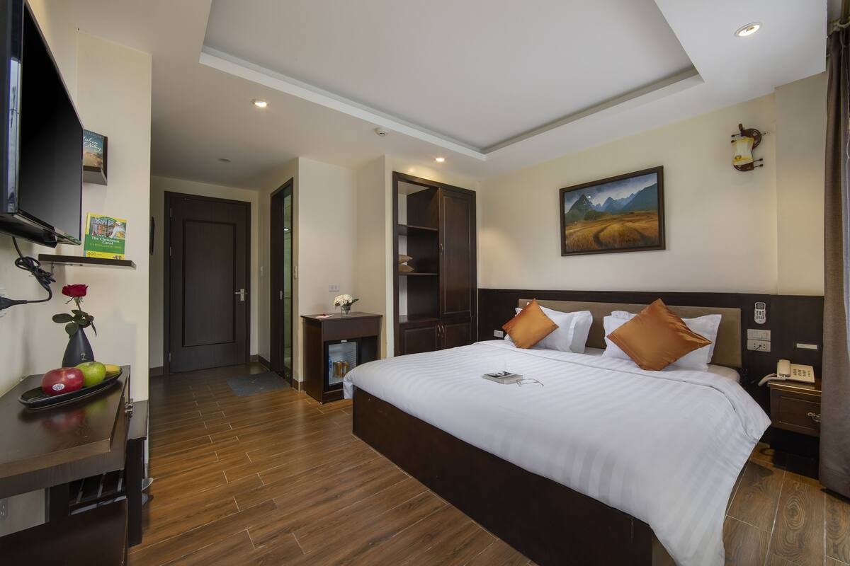 Quarto executivo | Frigobar, escrivaninha, ferros/tábuas de passar roupa, Wi-Fi de cortesia