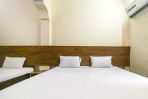 Quarto Standard | Roupa de cama fornecida