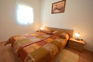 Apartamento, 2 quartos | Wi-fi grátis, roupa de cama fornecida 