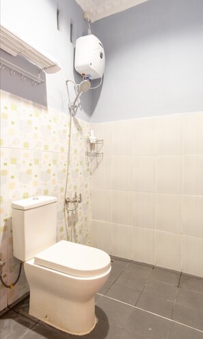 Chuveiro, toalhas de banho