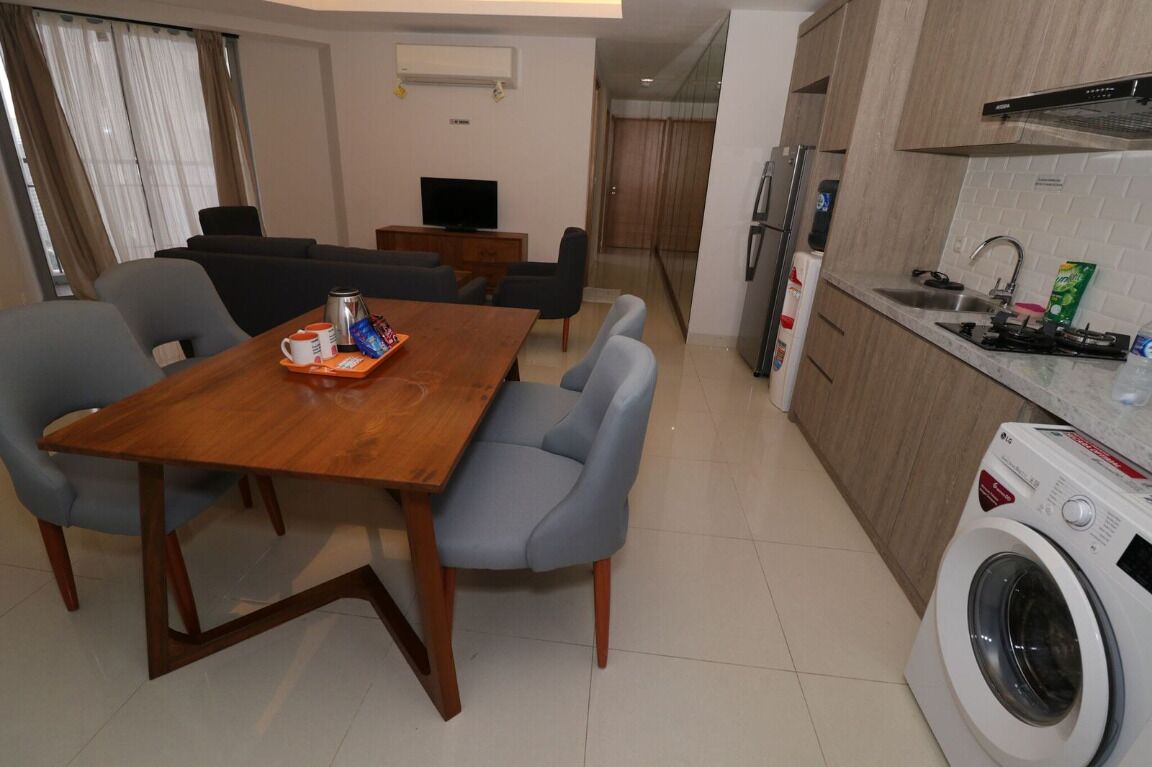 Apartamento, 2 quartos | Cozinha americana privada | Geladeira, cooktop, chaleira elétrica
