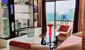 Quarto luxo | Área de estar