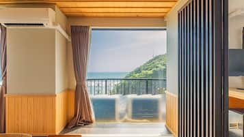 Suíte, para não fumantes, vista para o mar | 1 quarto, escrivaninha, espaço de trabalho para notebook