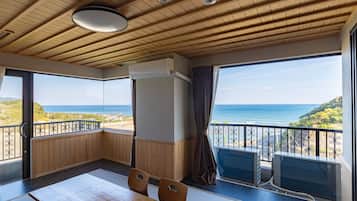 Suíte, para não fumantes, vista para o mar | 1 quarto, escrivaninha, espaço de trabalho para notebook