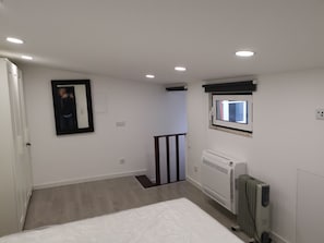 Duplex premium, 2 quartos | Cortinas blackout, ferros/tábuas de passar roupa, berços (sobretaxa)