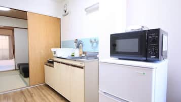 Apartamento, 1 quarto (I201) | Cozinha privada | Geladeira, micro-ondas, cooktop, chaleira elétrica
