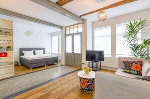 Apartamento, no piso térreo | Área de estar