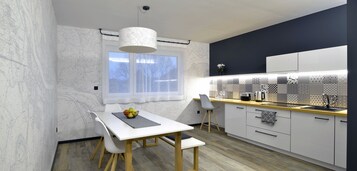 Apartamento conforto | Área de estar | TV de tela plana