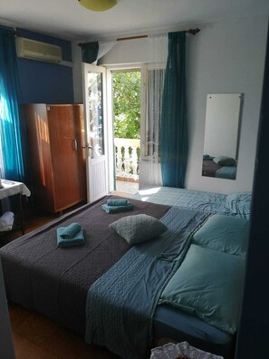 Apartamento família, 2 quartos, para fumantes, cozinha | Wi-Fi de cortesia, roupa de cama