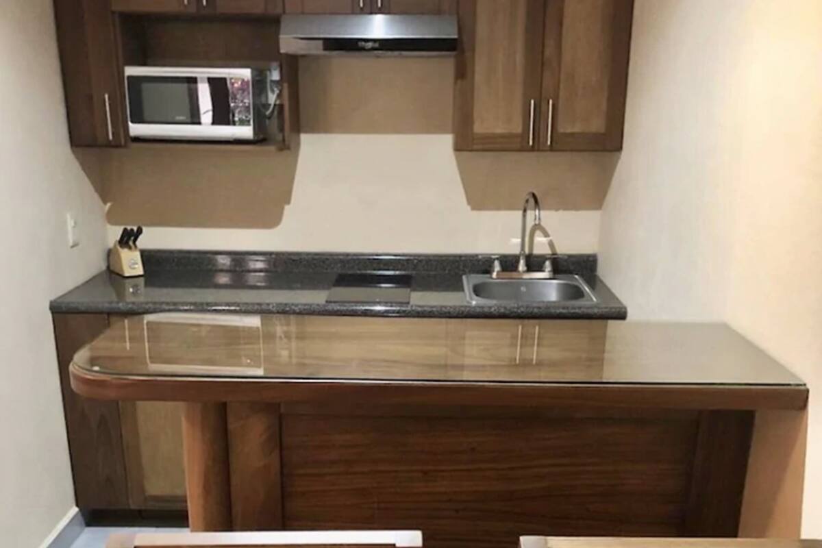Suite Júnior, várias camas | Cozinha privada