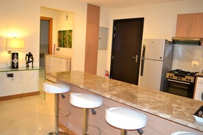 Apartamento (Murad) | Opções para refeição no quarto