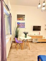 Apartamento superior | Área de estar