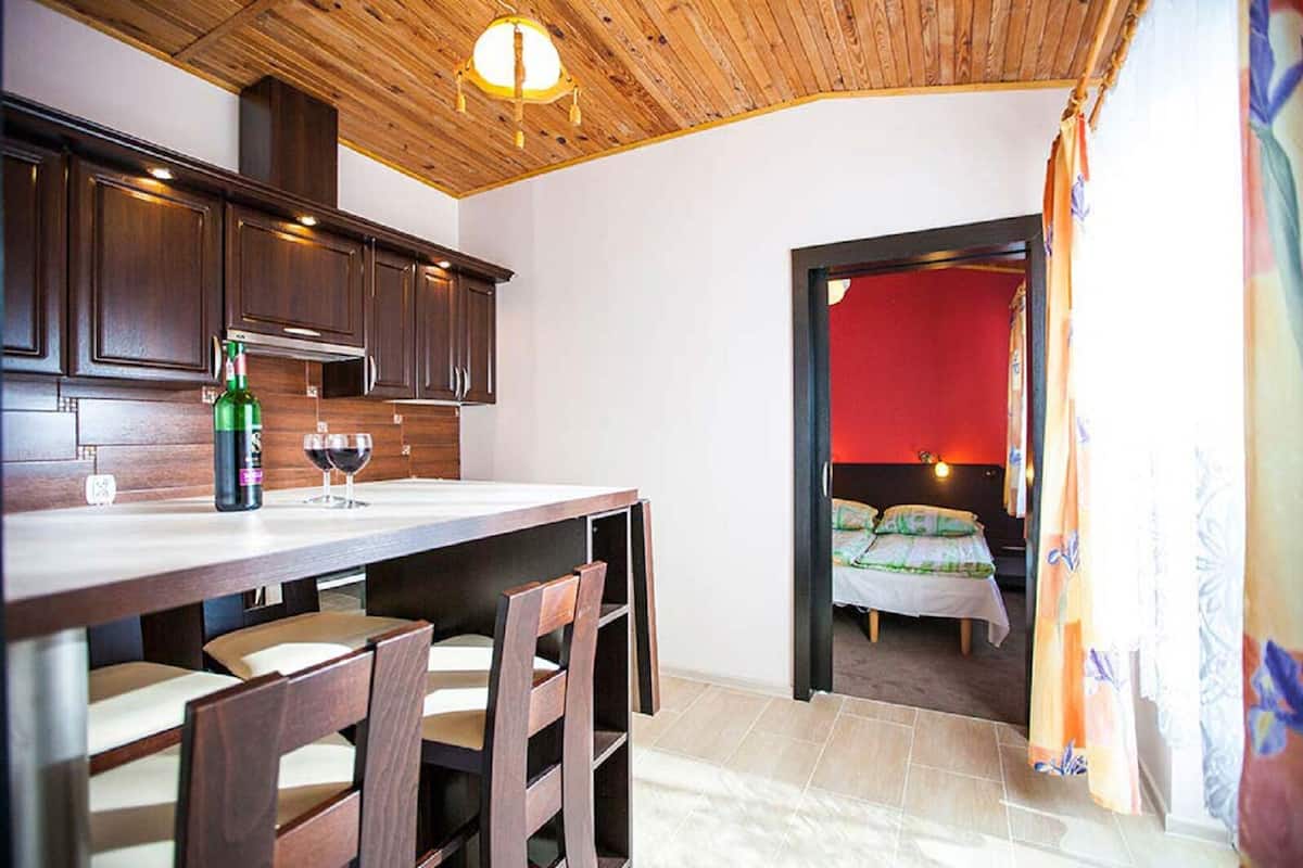 Apartamento conforto | Área de estar | TV de tela plana