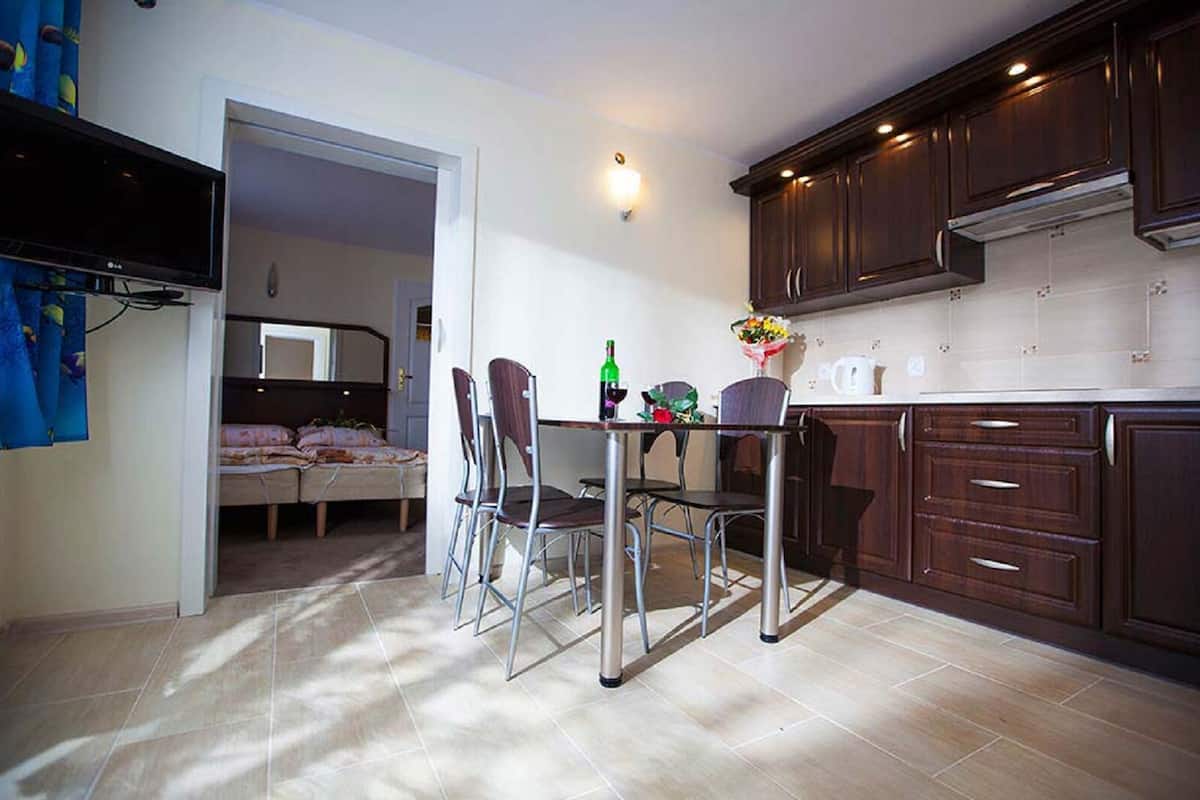 Apartamento conforto | Área de estar | TV de tela plana