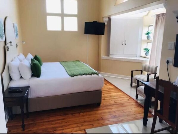 Quarto Duplo Deluxe, 1 quarto, vista para o mar | Minibar com produtos grátis, cofre no quarto, secretária