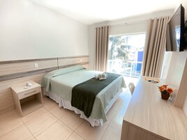 Quarto Deluxe | Minibar, Wi-fi grátis, roupa de cama fornecida 